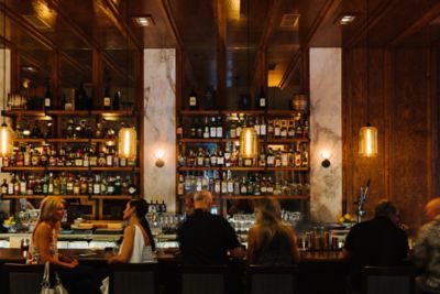 Modern Bar Pendant Lights Add Warmth in Top-Rated Steakhouse