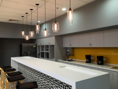 Various Pendant Light Glass Shapes Unite in an Office Breakroom