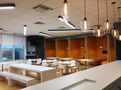 Various Pendant Light Glass Shapes Unite in an Office Breakroom